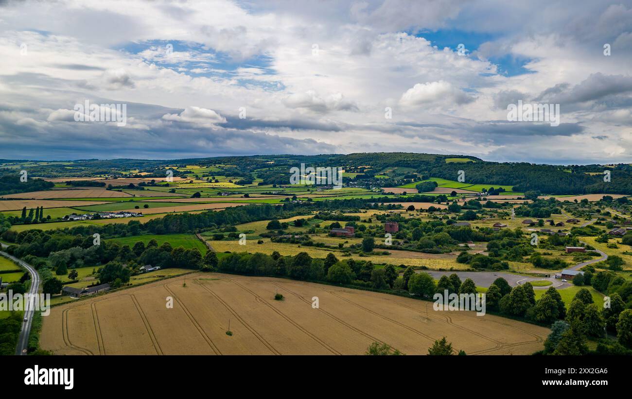Aerial view of agricultural farmland in rural Wales on a stormy summer ...