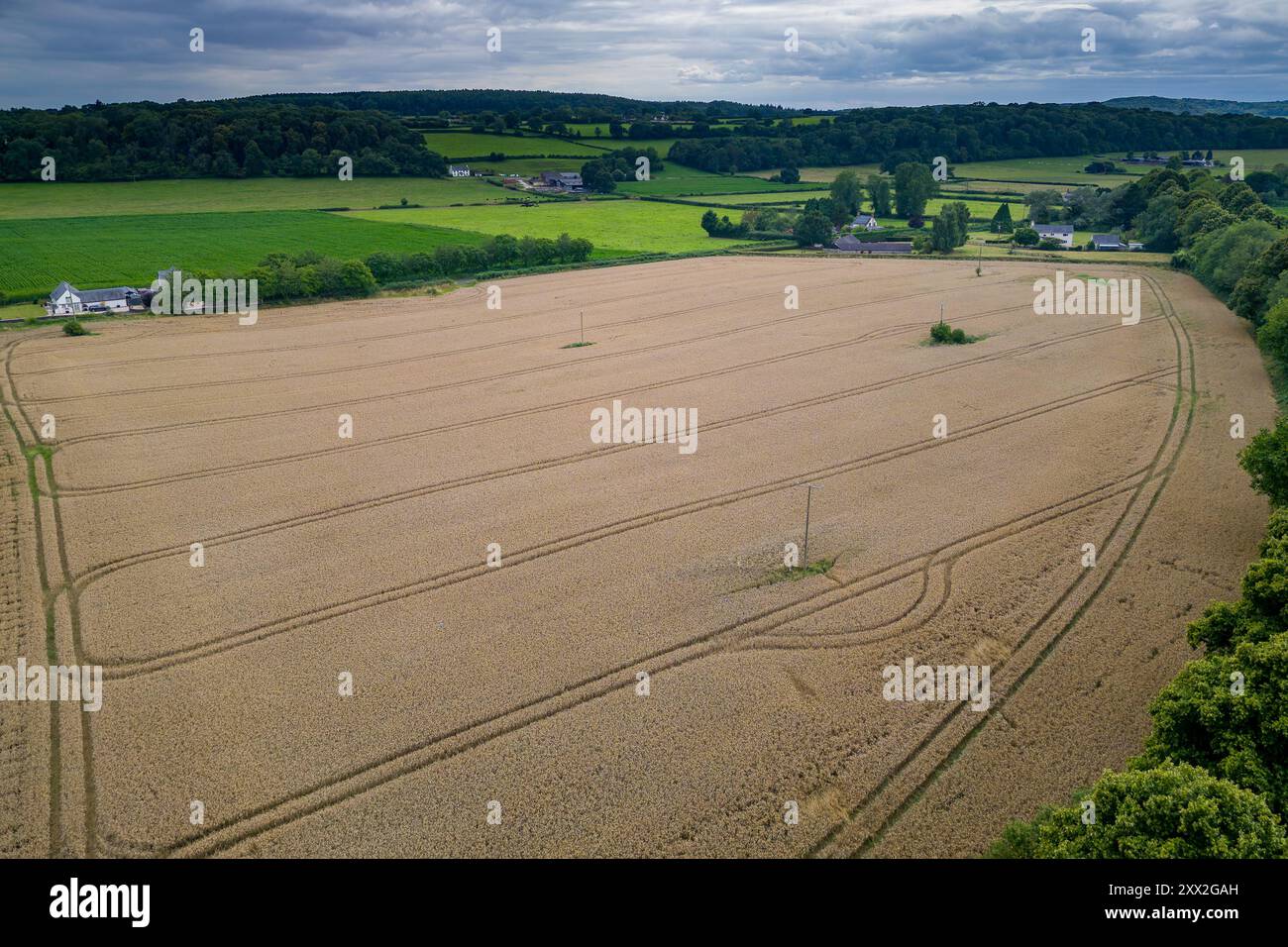 Aerial view of agricultural farmland in rural Wales on a stormy summer ...