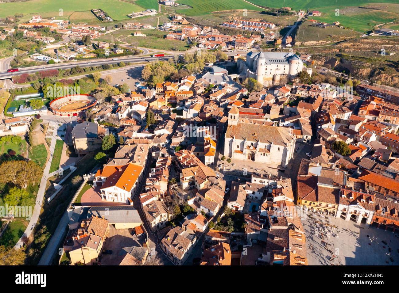 Drone view of Simancas townscape with Plaza Mayor, parish church and ...