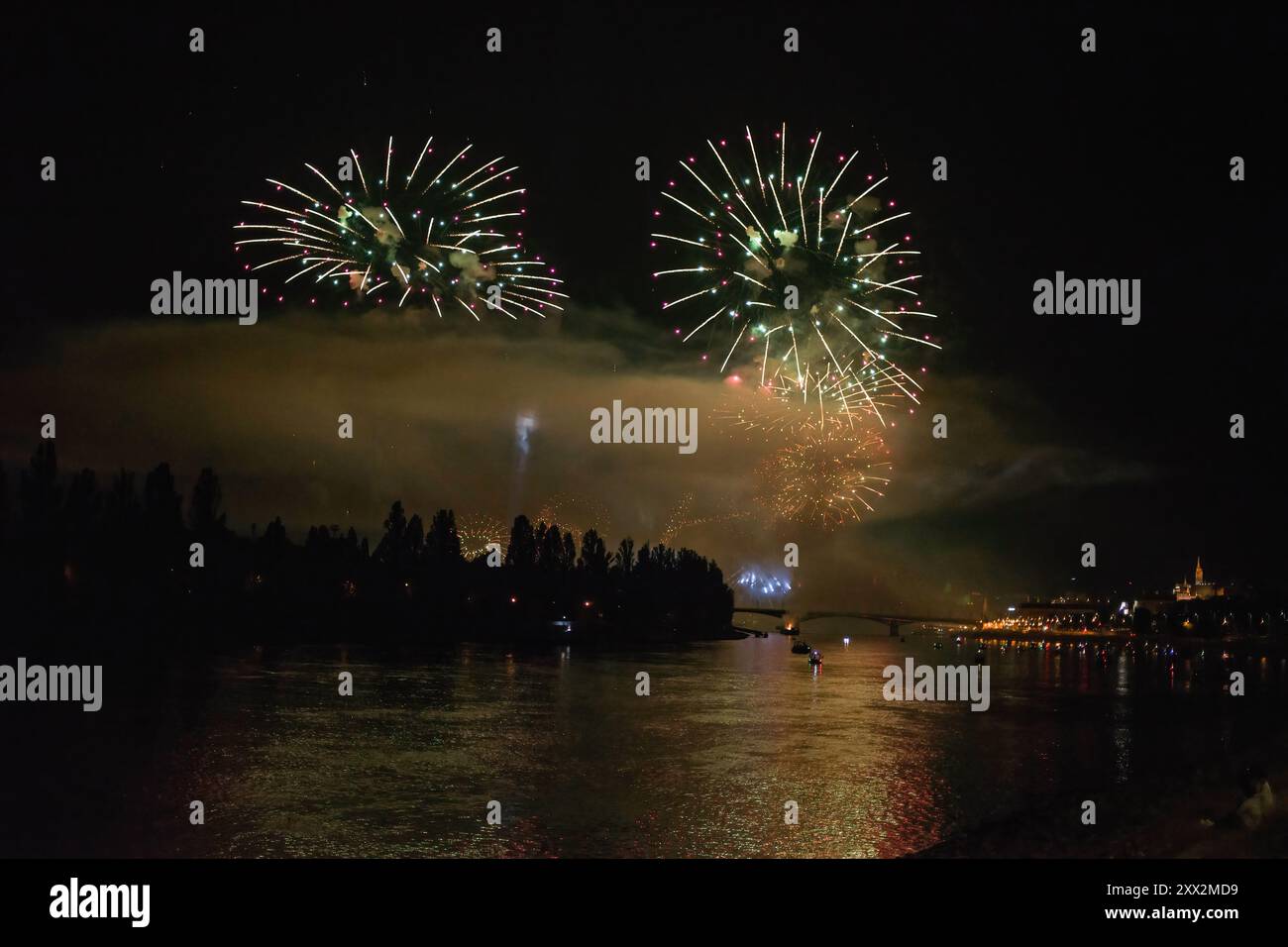 Spectacular fireworks are held above the Danube river in Budapest during the Saint Stephen's Day ...