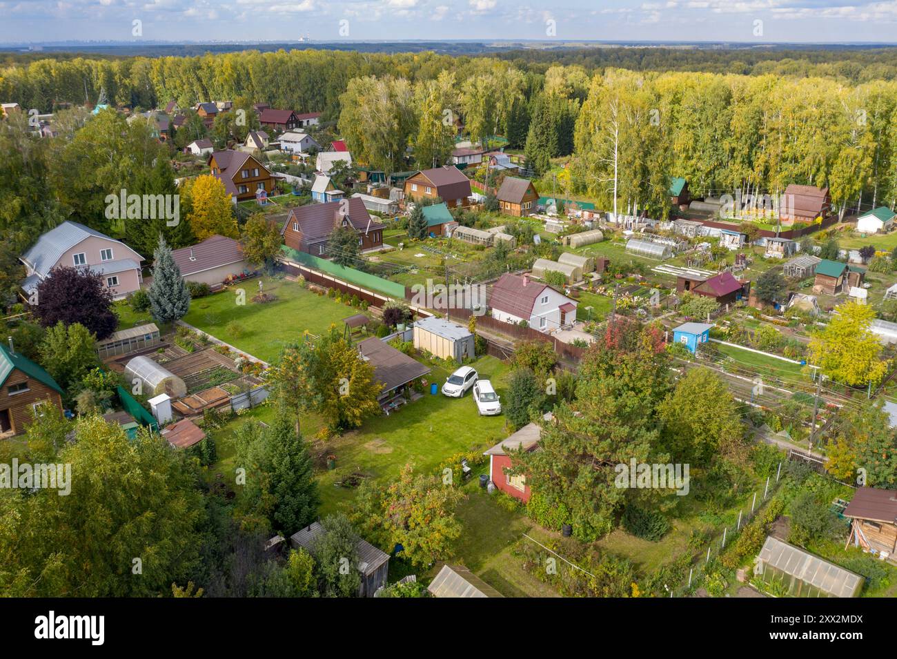 Aerial view of summer cottages in the suburbs in Siberia in summer ...
