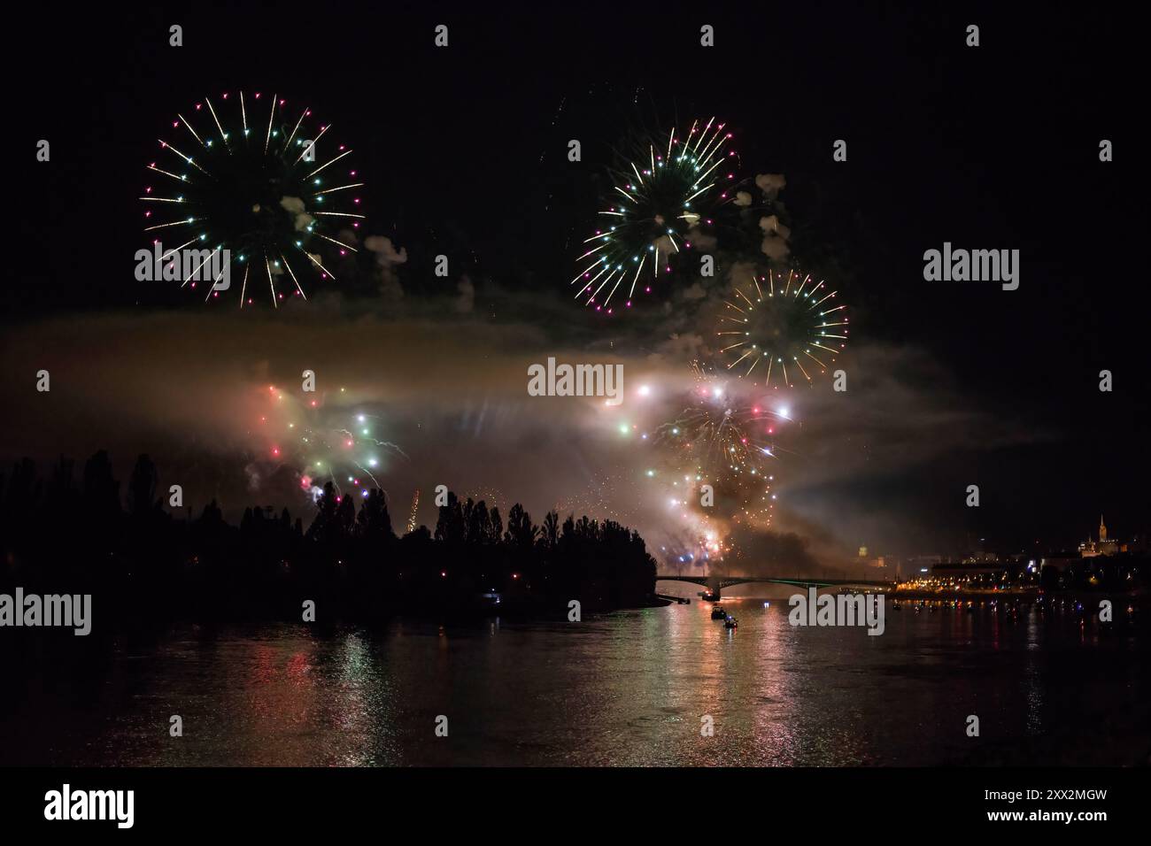 Spectacular fireworks are held above the Danube river in Budapest during the Saint Stephen's Day ...