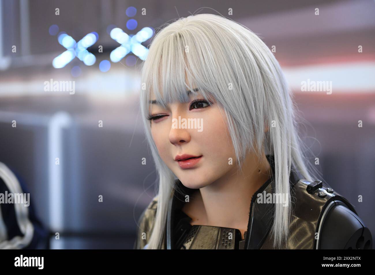 Beijing, China. 21st Aug, 2024. A humanoid robot winks at the World ...