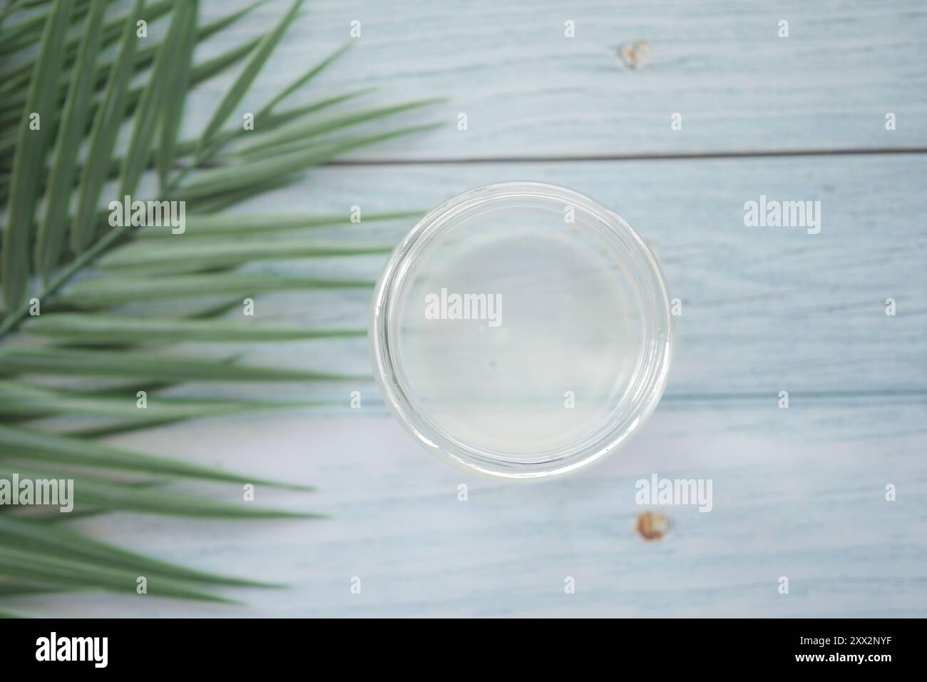 Coconut oil in container leaf hi-res stock photography and images - Alamy