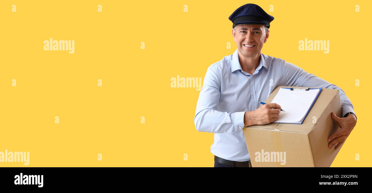 Mature postman with clipboard and parcel on yellow background with ...