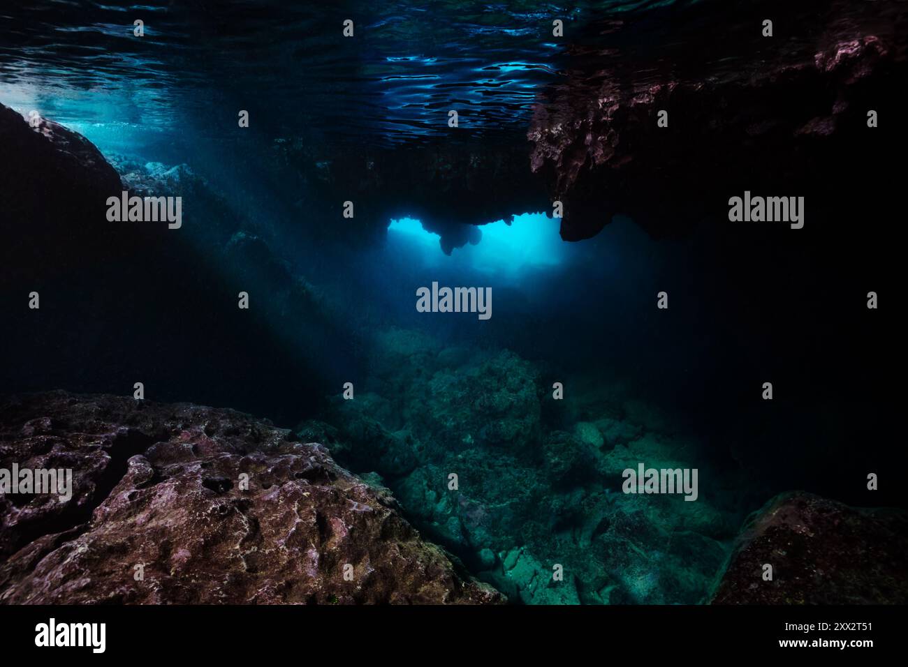 An underwater cave that opens up within the lava rock to open air, but ...