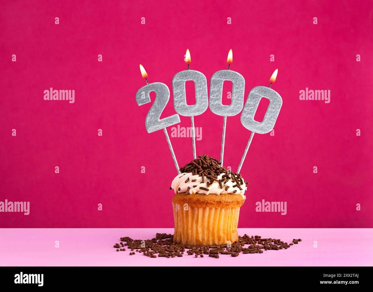 Birthday celebration with candle number 2000 - Chocolate cupcake on ...