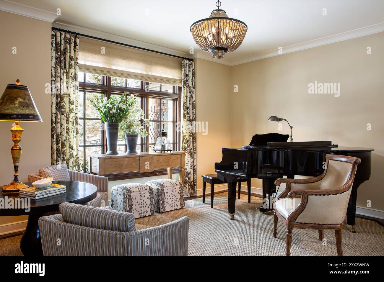 Music room with grand piano and seating Stock Photo - Alamy