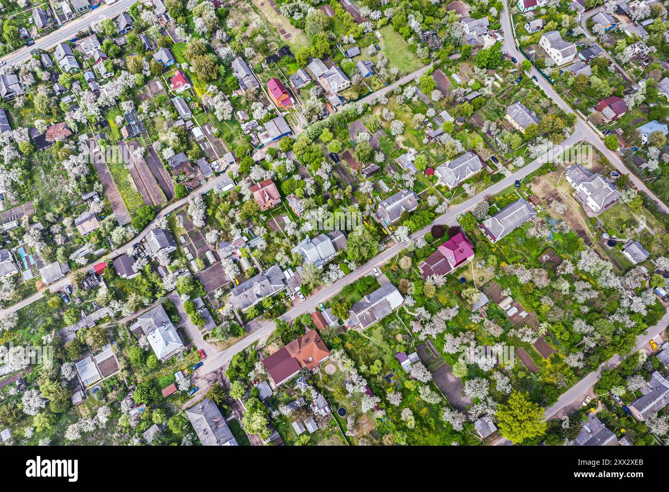 aerial view of a residential suburb neighborhood on a sunny spring day ...
