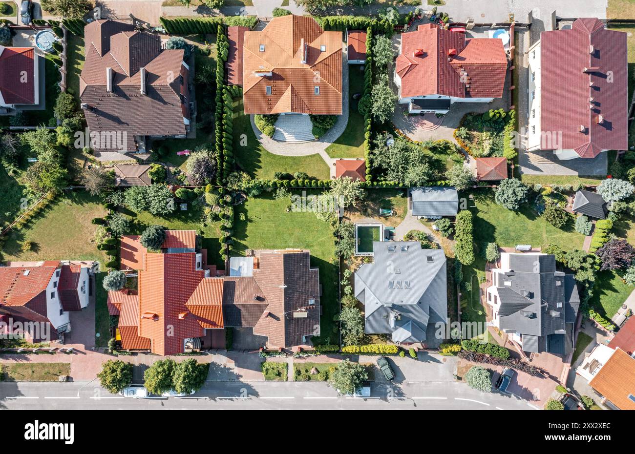 aerial view of contemporary private houses with red tiled roofs in ...