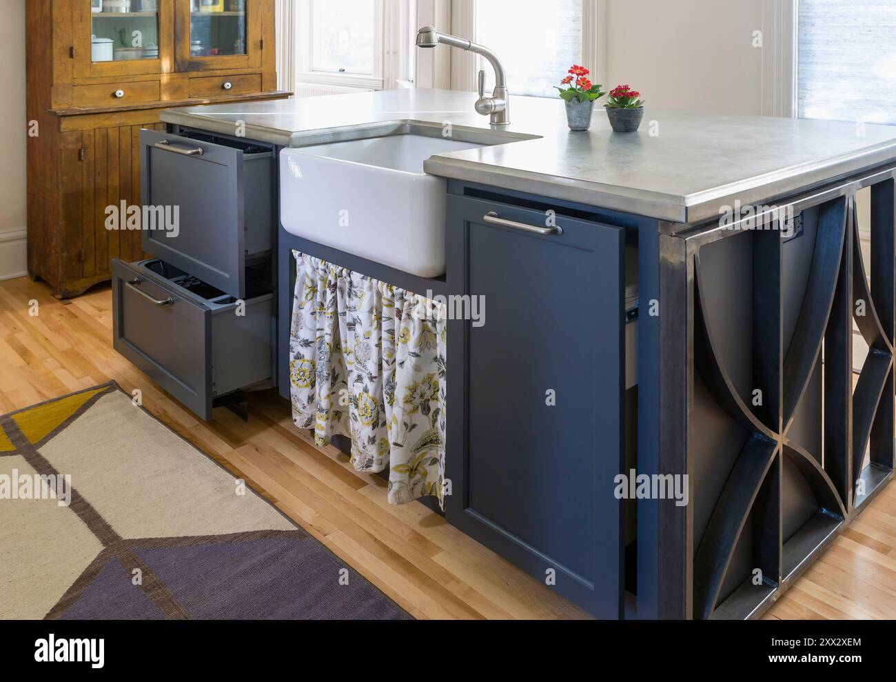 Kitchen island showing pull out trash drawer and pull out dishwasher ...