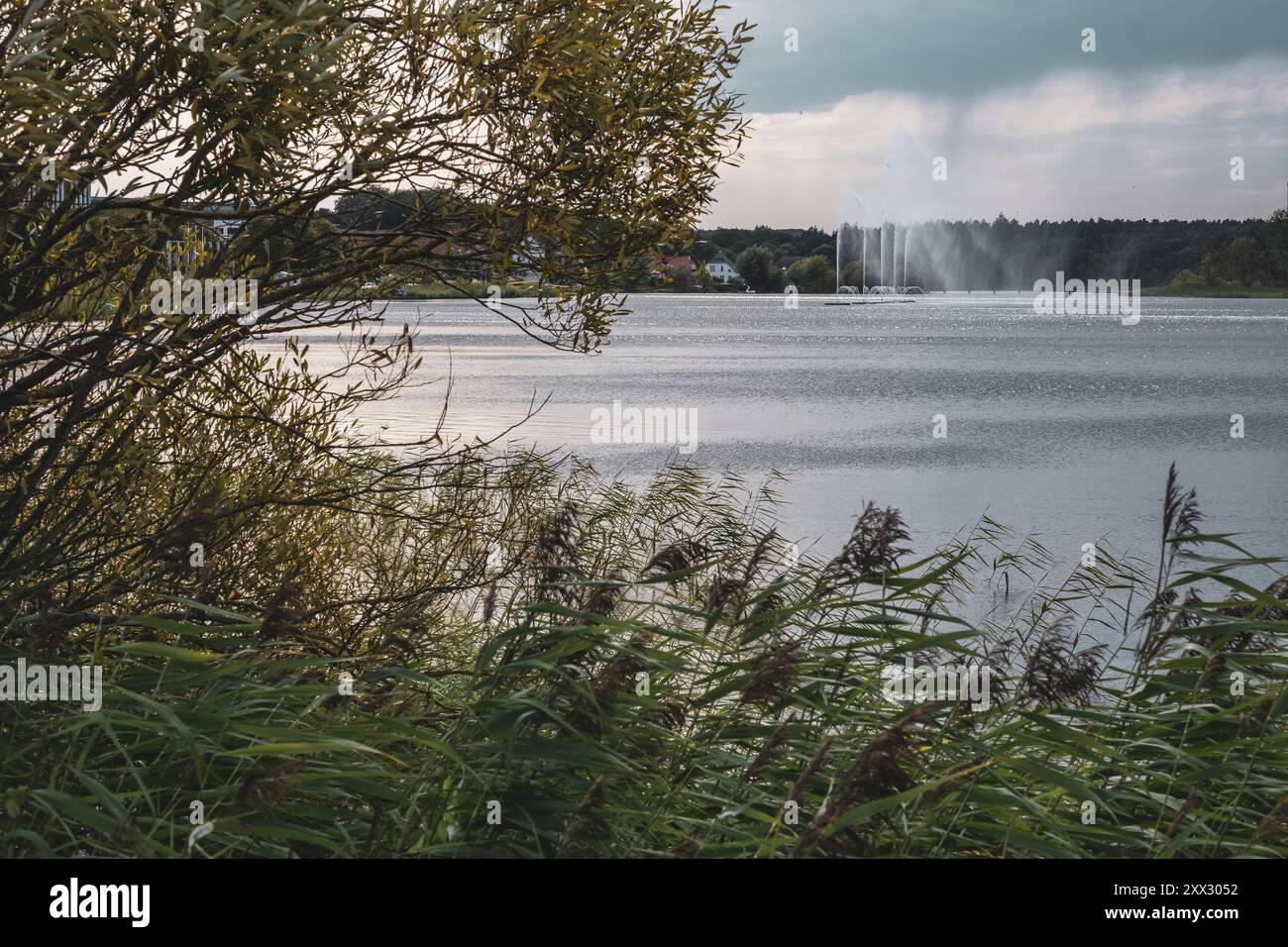 Grass and fountains along the Gudenå River in Silkeborg, Denmark Stock ...