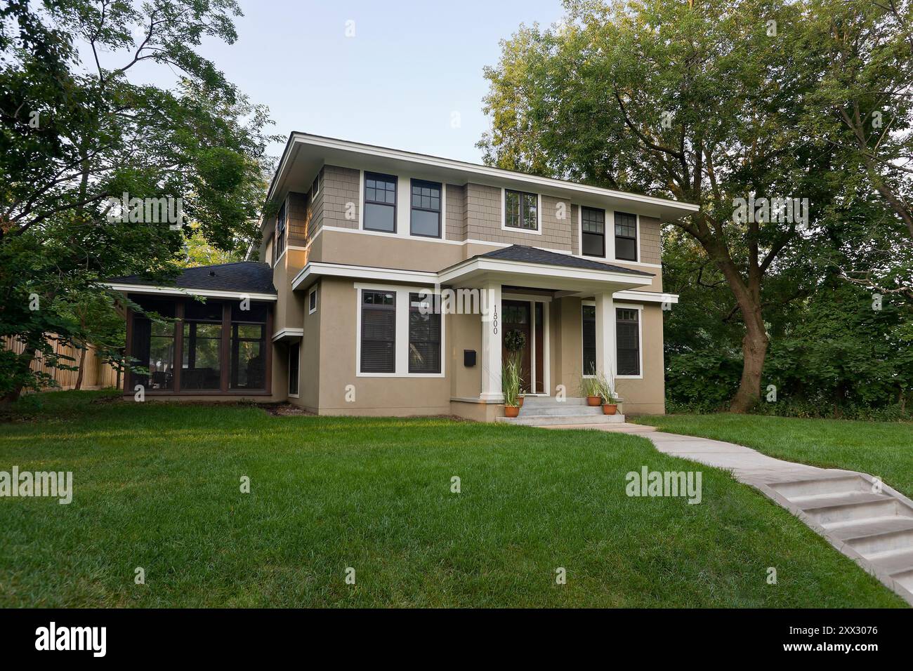 Remodeled four square house with stucco lower half and cedar shake ...
