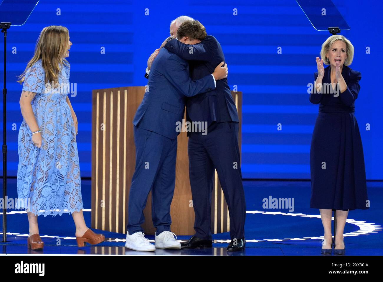 Democratic vice presidential nominee Minnesota Gov. Tim Walz, center ...
