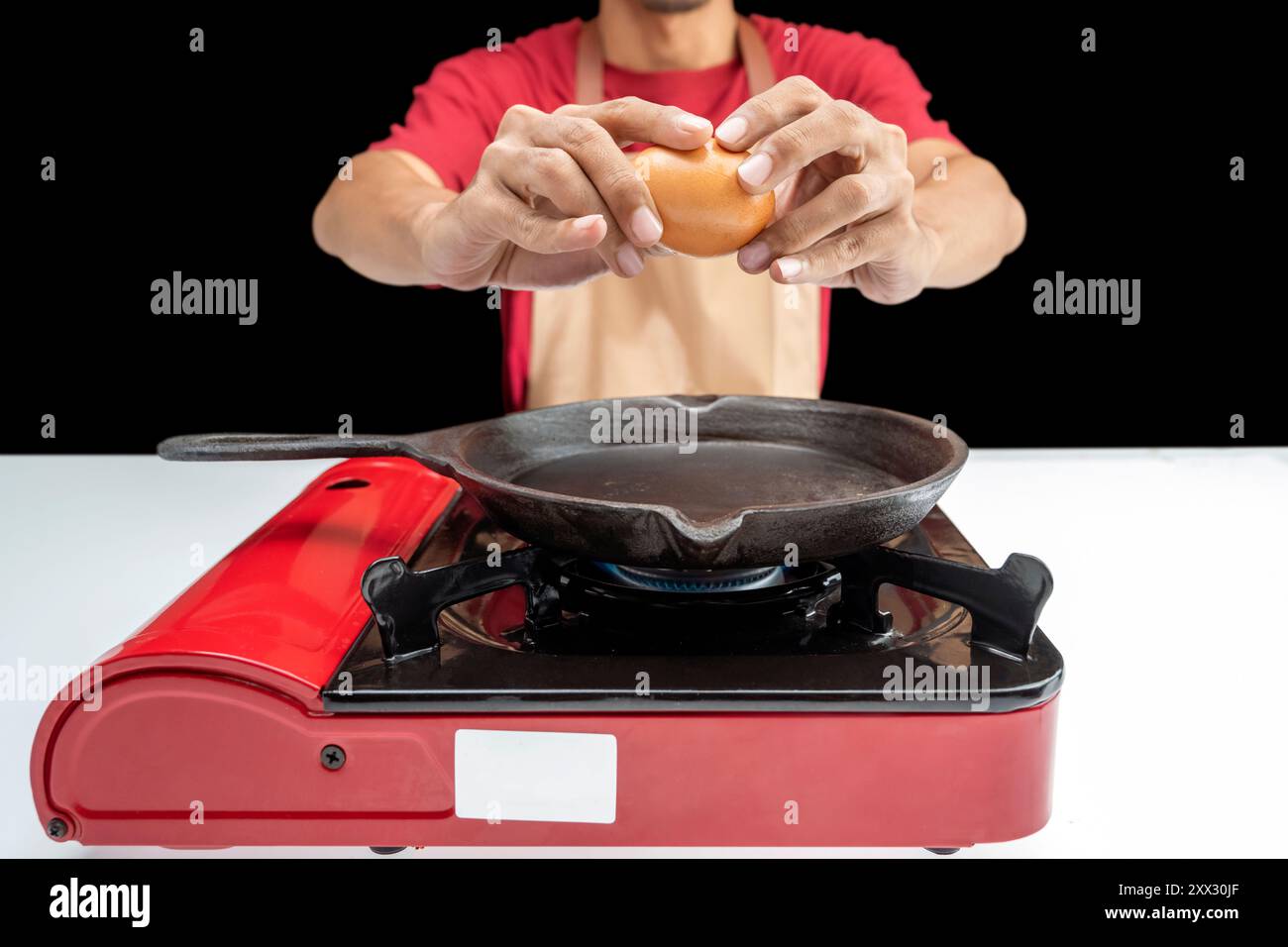 Male hands cooking on stove hi-res stock photography and images - Alamy