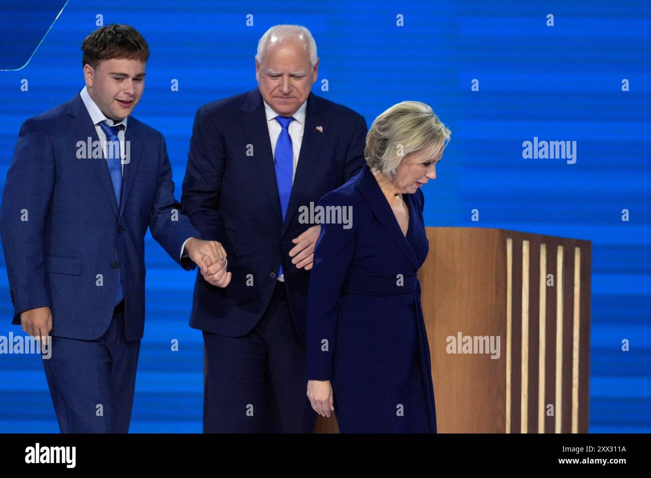 Democratic vice presidential nominee Minnesota Gov. Tim Walz, center ...