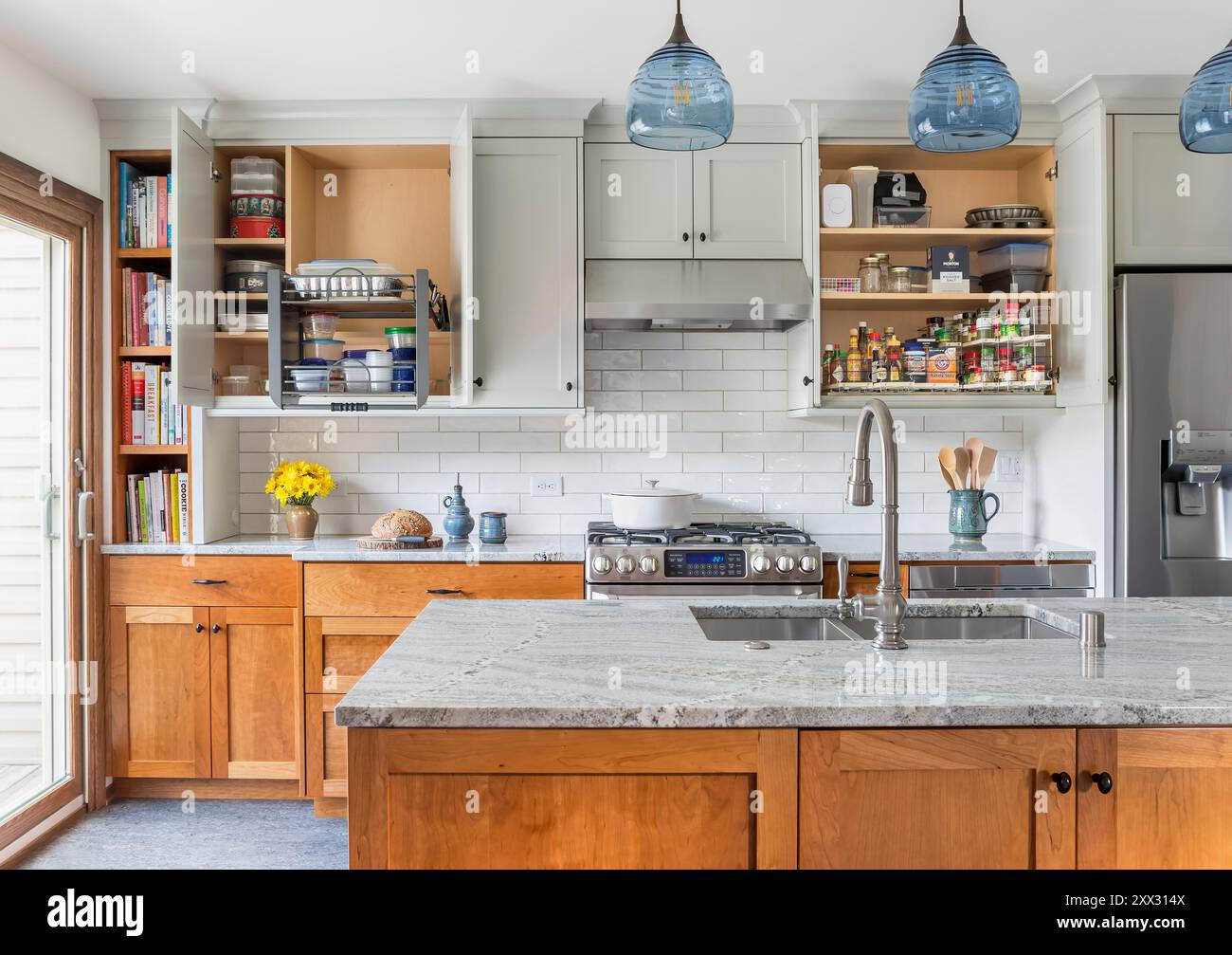 New kitchen with blue gray upper cabinets and red birch lower cabinets ...