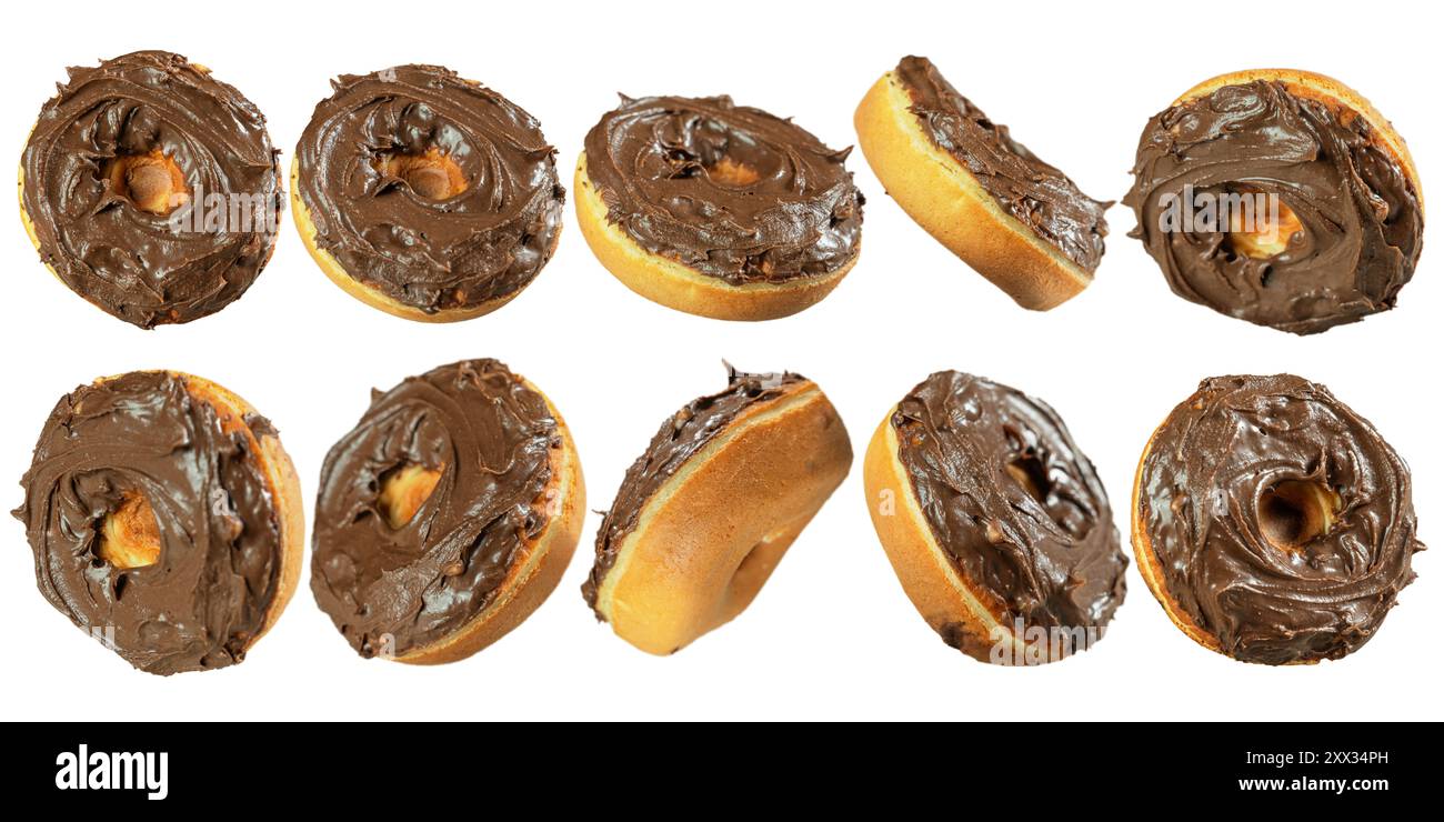 A series of mini donuts with chocolate frosting. The donuts are ...