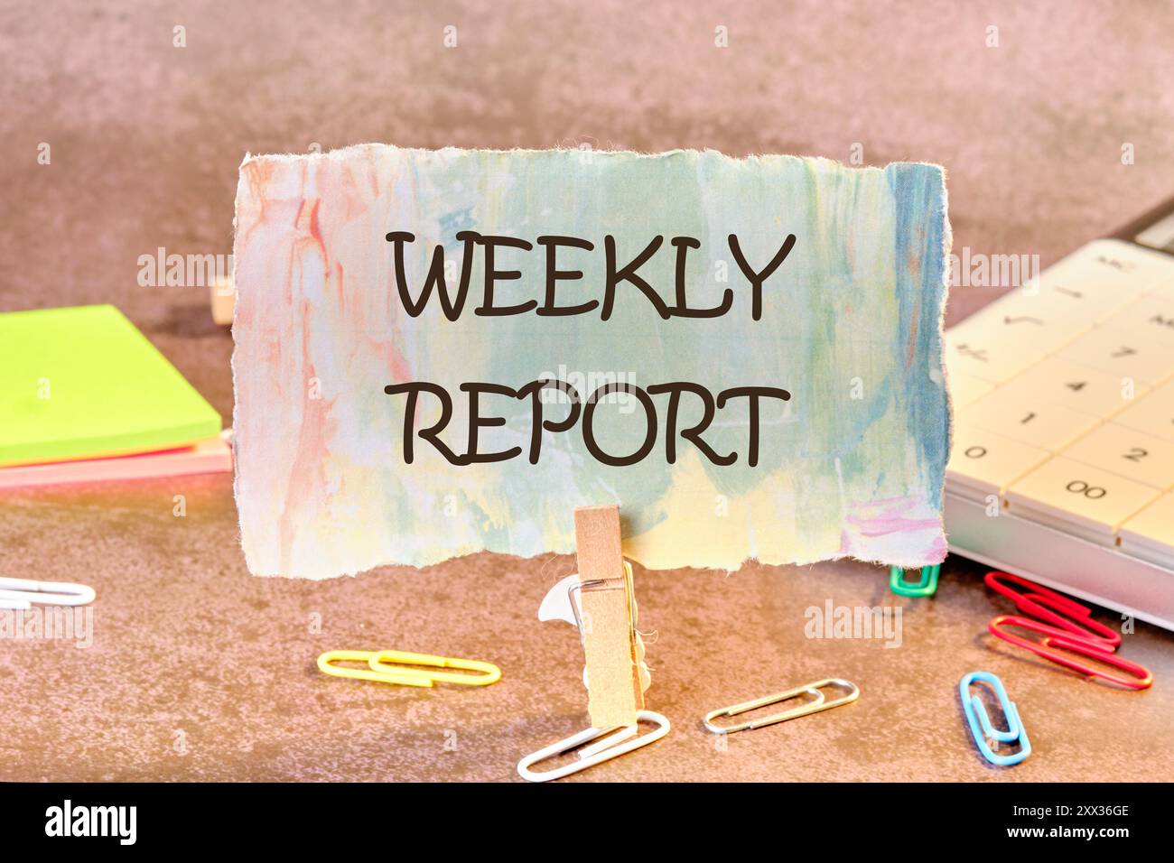 Conceptual weekly report symbol. Copy space. WEEKLY REPORT words ...