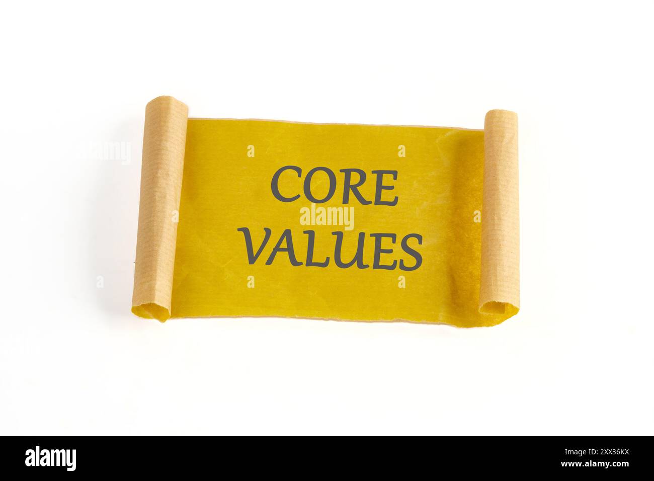 Business and core values concept on paper, a mustard-colored note on a ...