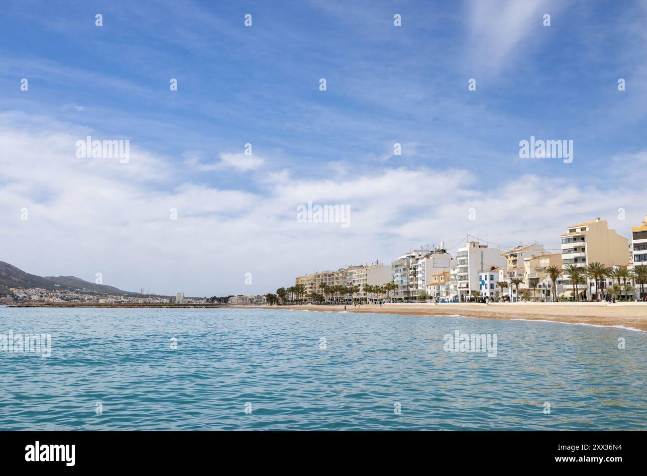 Photo of the beautiful beach in Altea, Alicante in Spain showing hotels ...