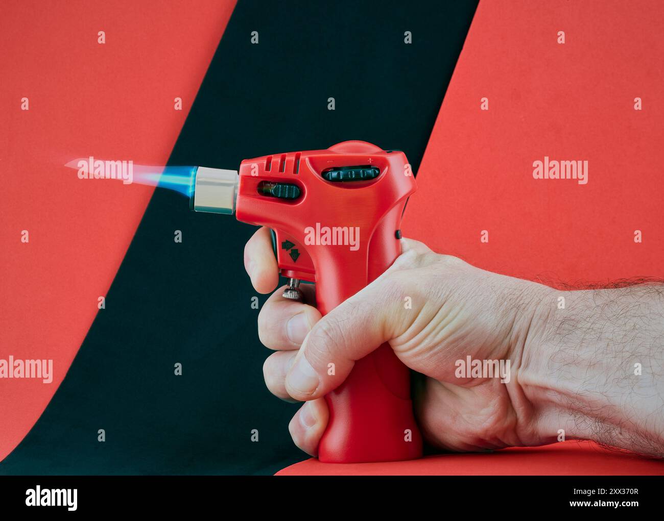 Hand lighting lighter large flame hi-res stock photography and images ...