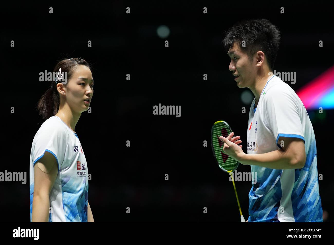 (240822) -- YOKOHAMA, Aug. 22, 2024 (Xinhua) -- Cheng Xing (R)/Zhang Chi of China react during ...