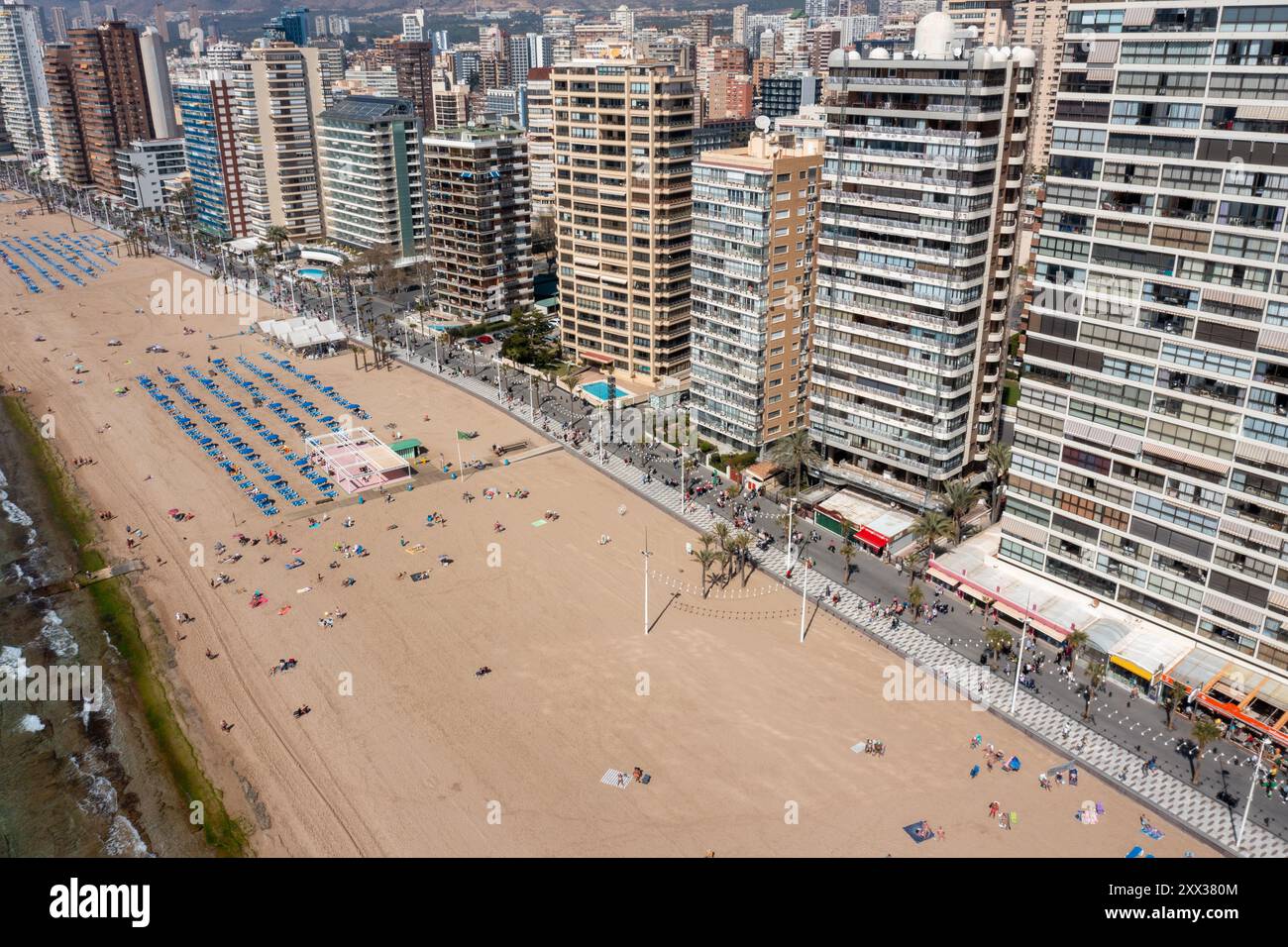 Aerial drone photo of the town of Benidorm in Spain in the summer time ...