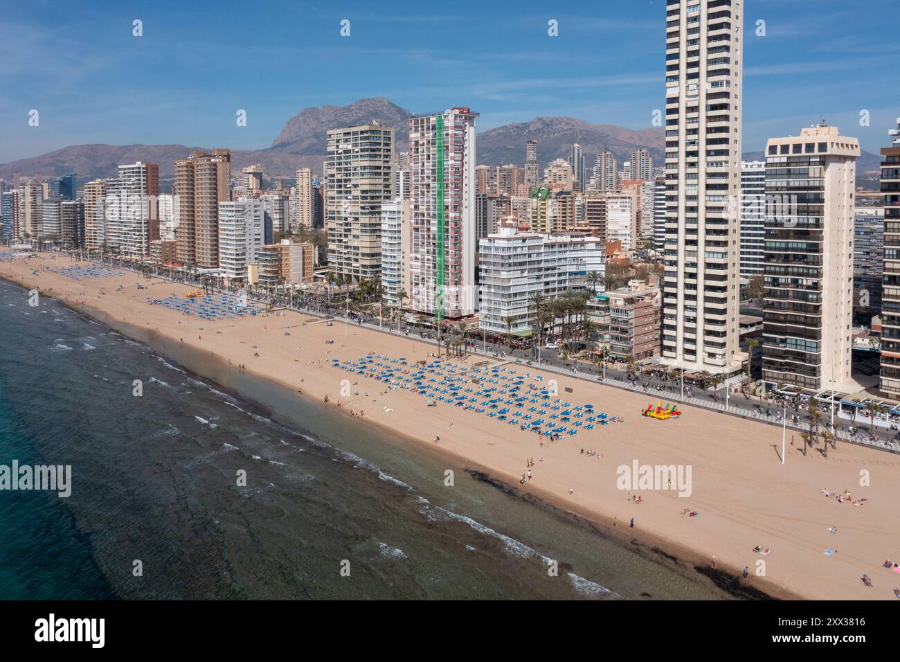 Aerial drone photo of the town of Benidorm in Spain in the summer time ...