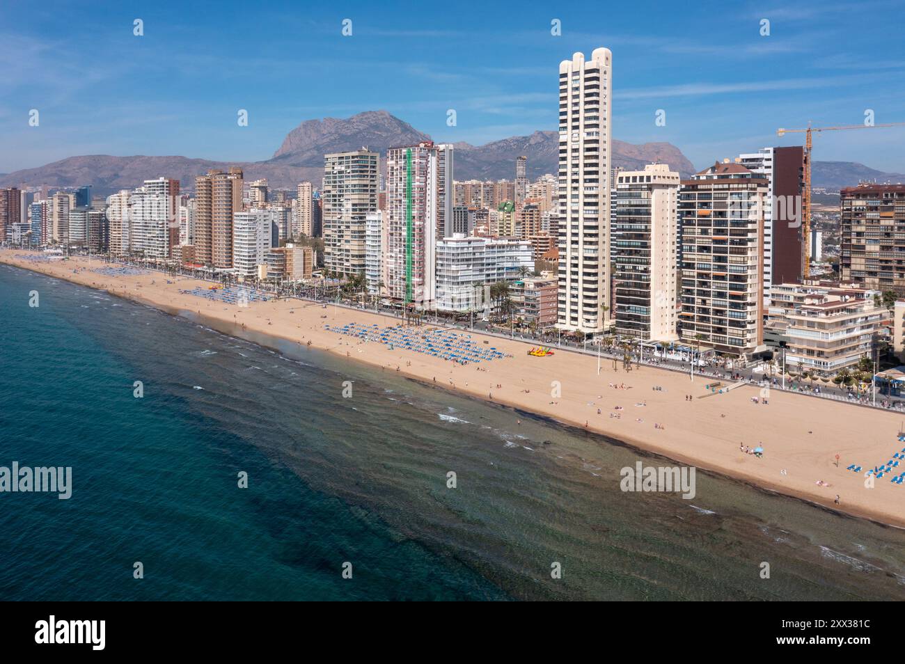 Aerial drone photo of the town of Benidorm in Spain in the summer time ...