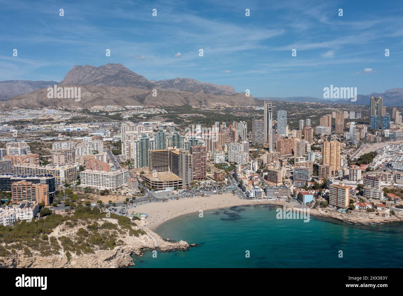 Aerial drone photo of the town of Benidorm in Spain in the summer time ...