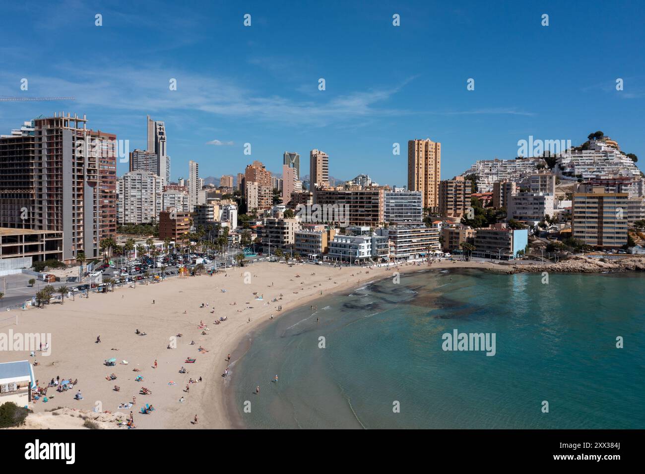 Aerial drone photo of the town of Benidorm in Spain in the summer time ...