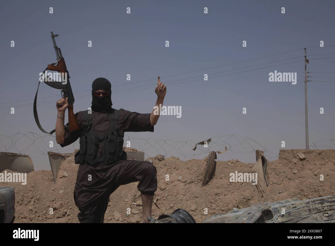 An Islamic State fighter from Tunisia immediately after the Islamic ...