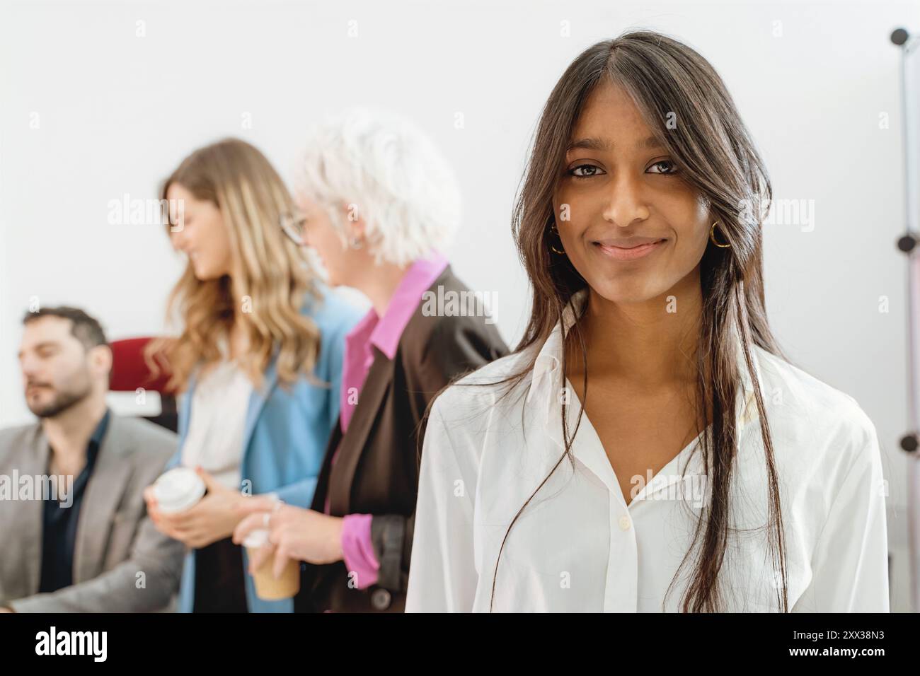 Portrait of a confident young businesswoman of color in a diverse ...