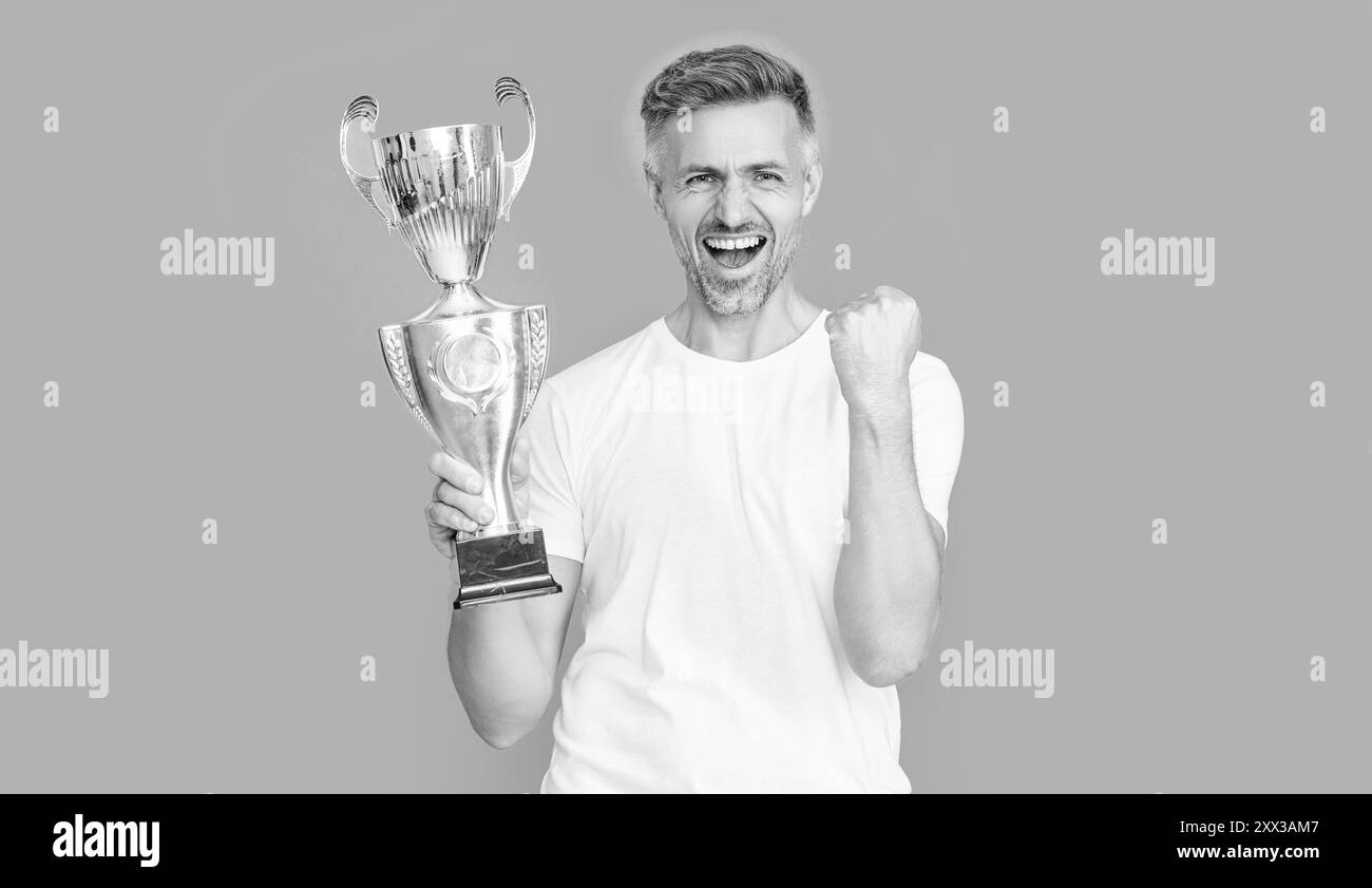 successful champion man celebrate victory with award in studio ...
