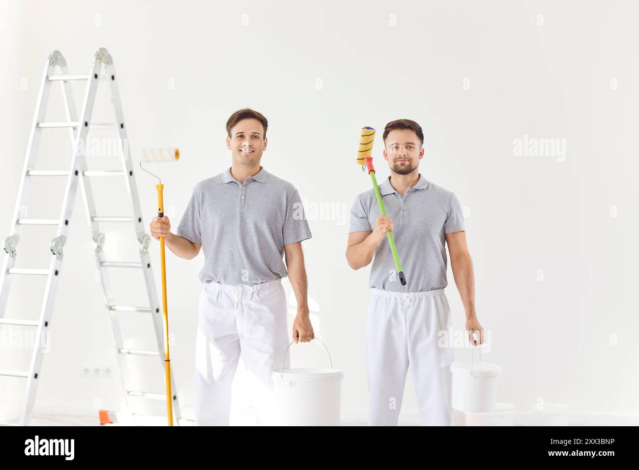 Happy male house painters hi-res stock photography and images - Alamy