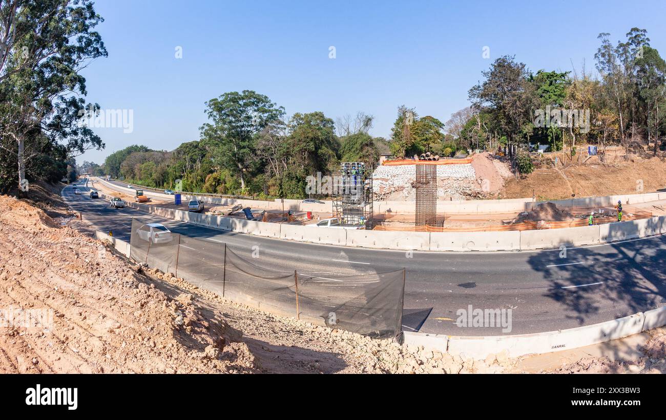 New Bridge construction site over road highway traffic vehicles with ...