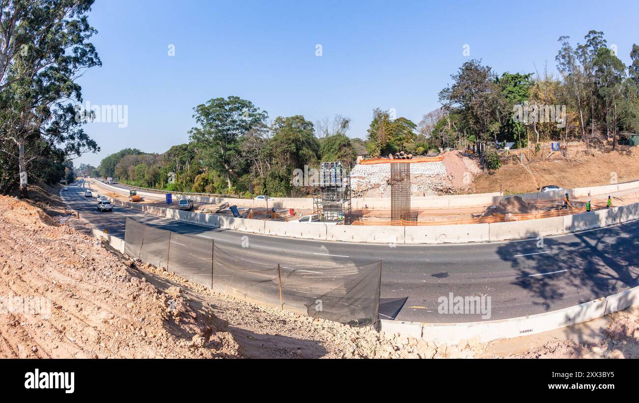 New Bridge construction site over road highway traffic vehicles with ...