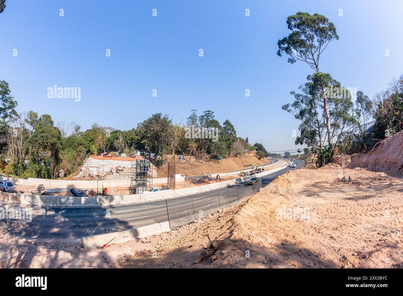 New Bridge construction site over road highway traffic vehicles with ...