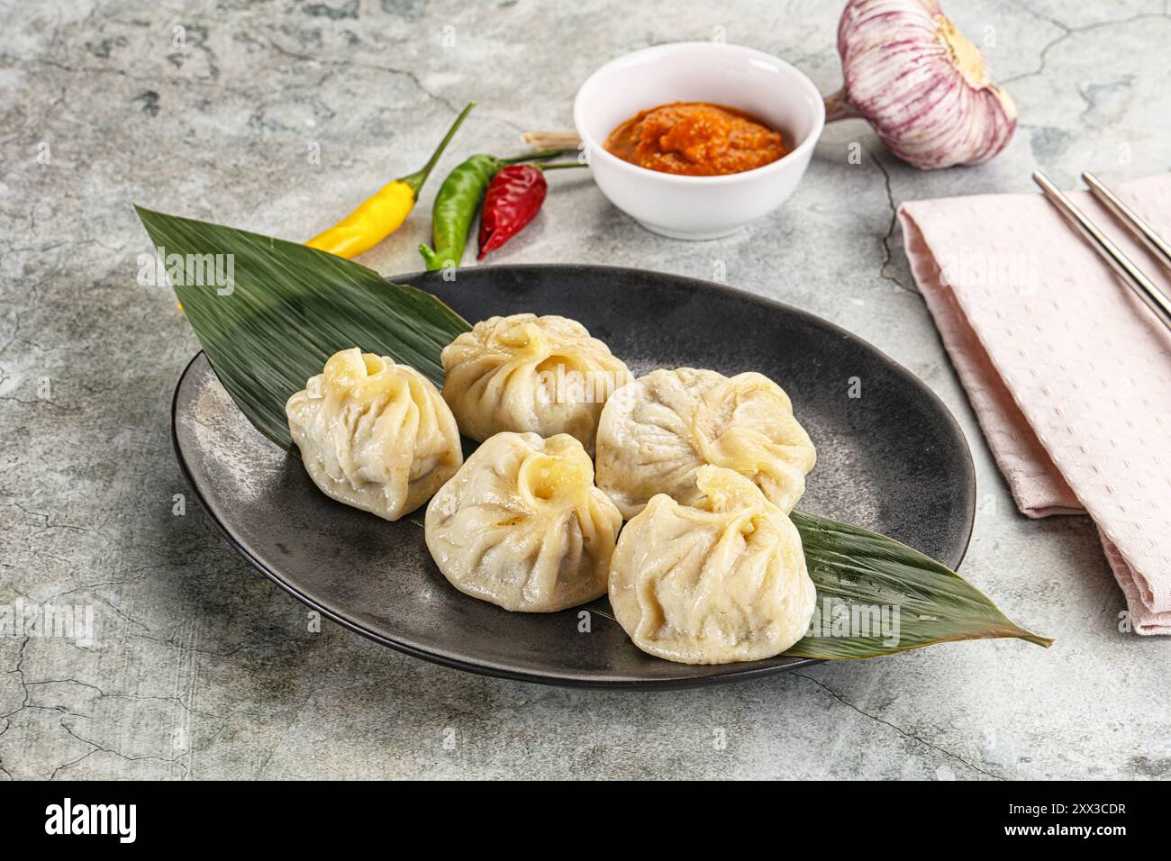 Chinese traditional steamed dumpligs momo with meat Stock Photo - Alamy