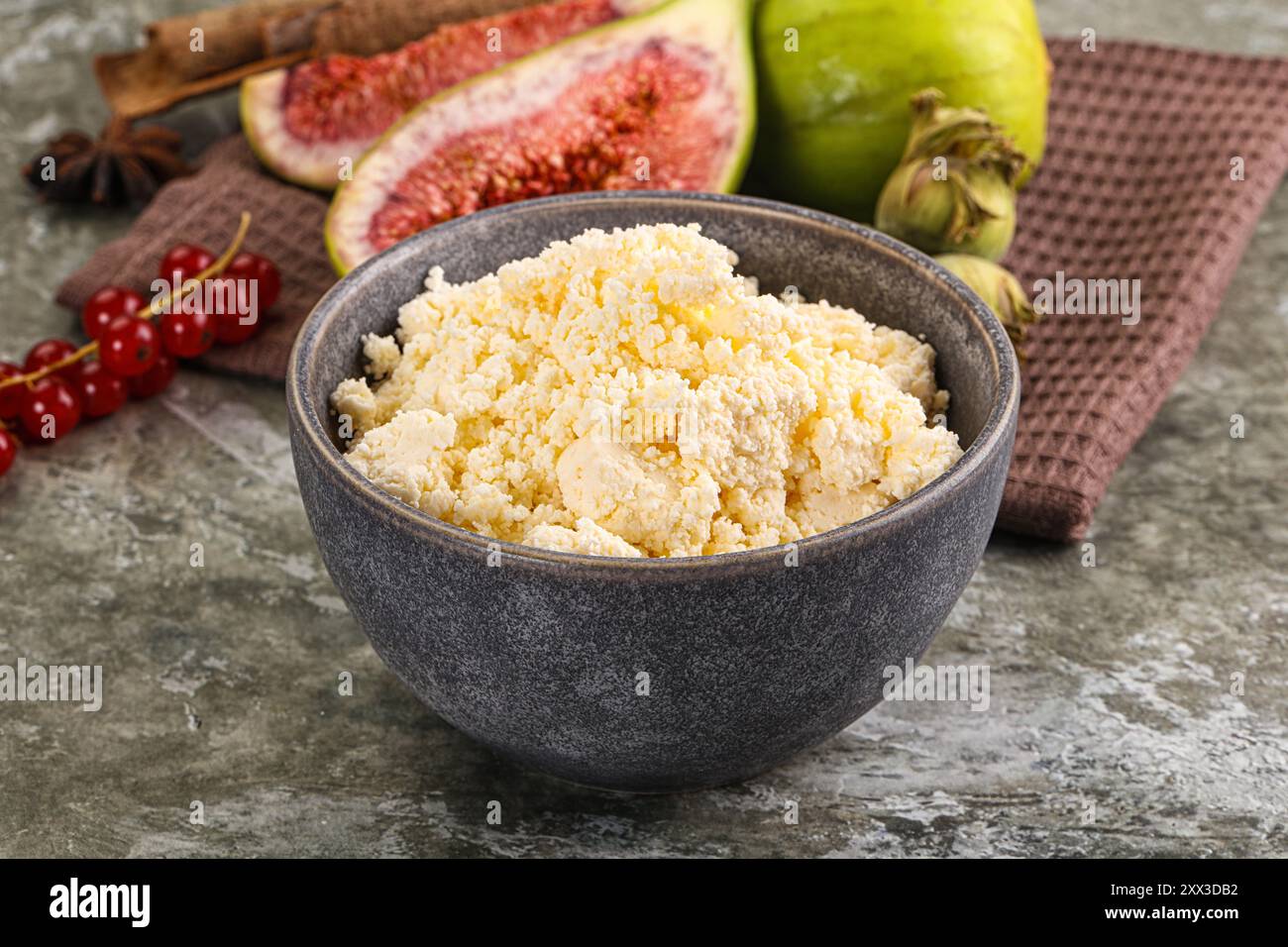 Delicous sheep cottage cheese curd served fig Stock Photo - Alamy