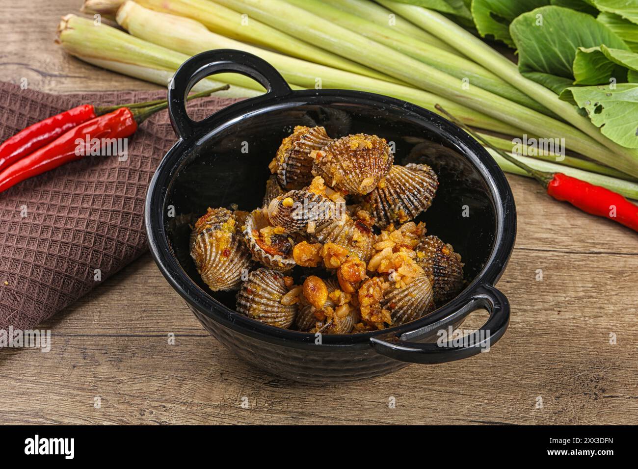 Blood Cockle Fried With Garlic and spices Stock Photo - Alamy