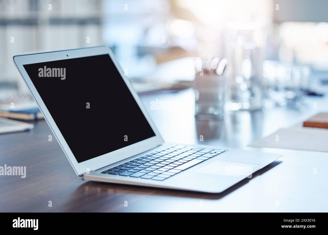 Laptop, blank screen and desk in office for mockup, space or ui for ...