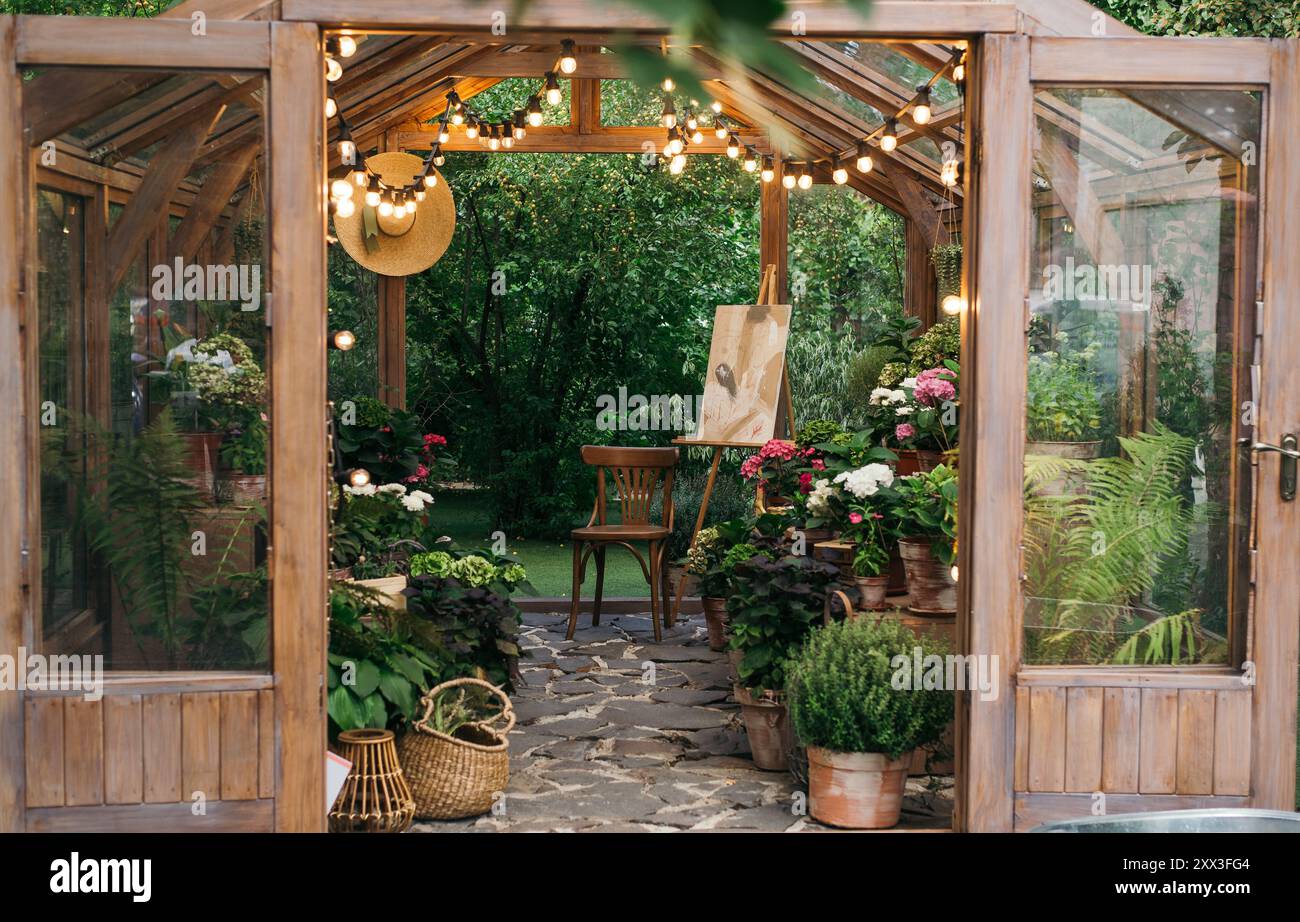Wood and glass greenhouse, plants and nature with home gardening ...