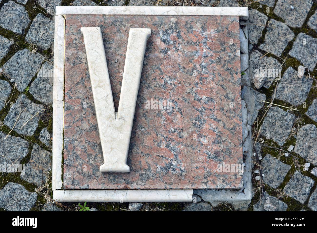 Building materials, memorials, white inscriptions in gray, brown ...