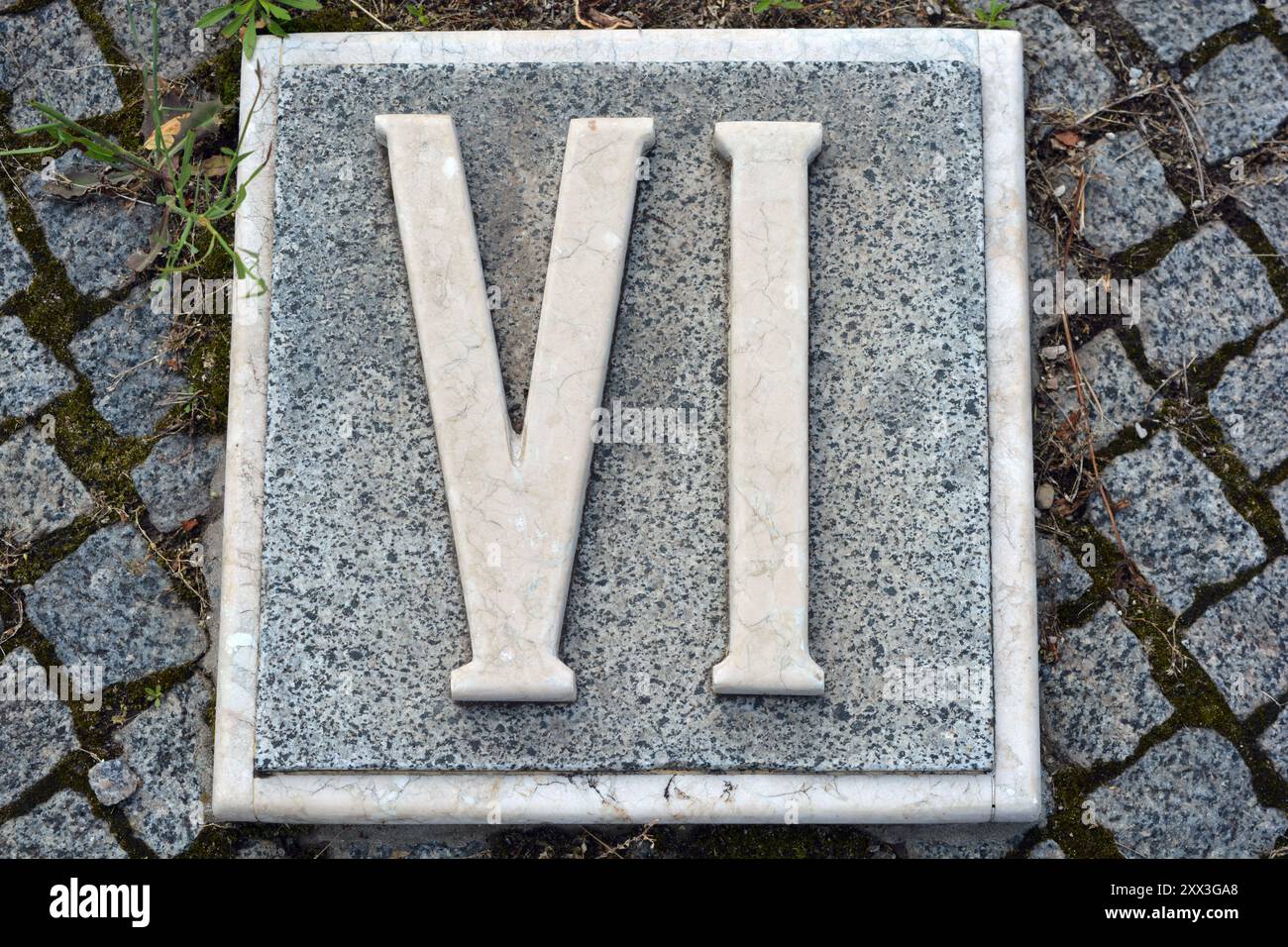 Building materials, memorials, white inscriptions in gray, brown ...