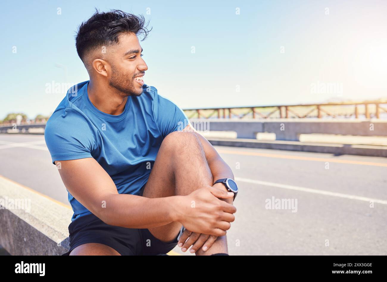Happy, thinking and fitness of man on road with rest and break from ...