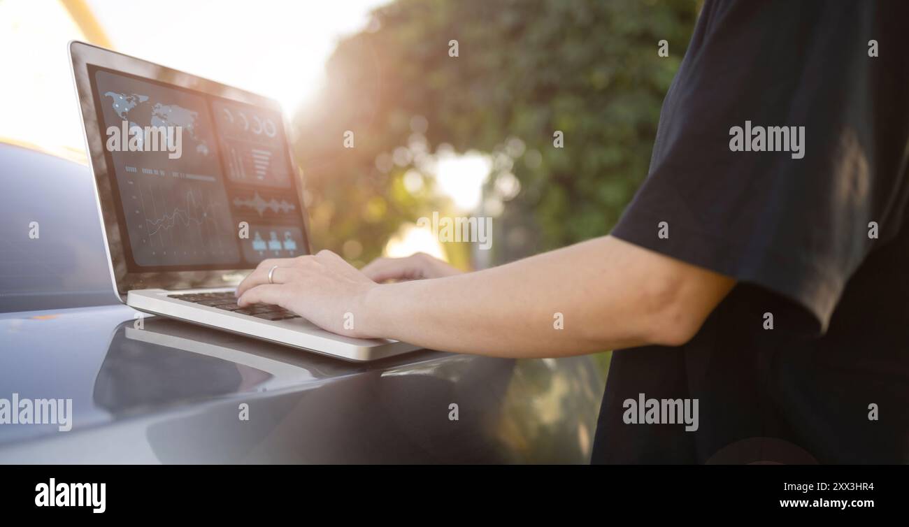 A professional woman is working remotely on her laptop in a serene ...