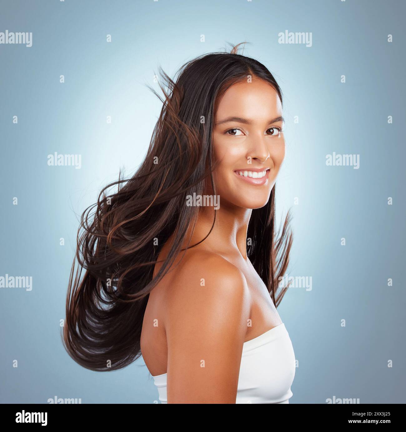 Happy woman, wind and hairstyle in studio portrait, texture treatment ...