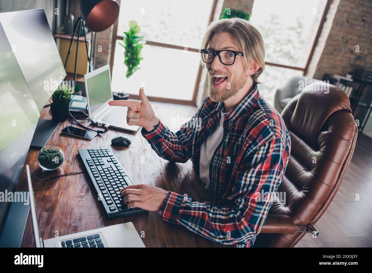 Photo funny young blond hair software developer guy at loft design ...